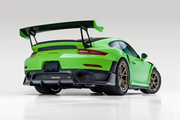 Rear bumper lower diffuser in high gloss carbon fibre. Porsche 991.2 ...